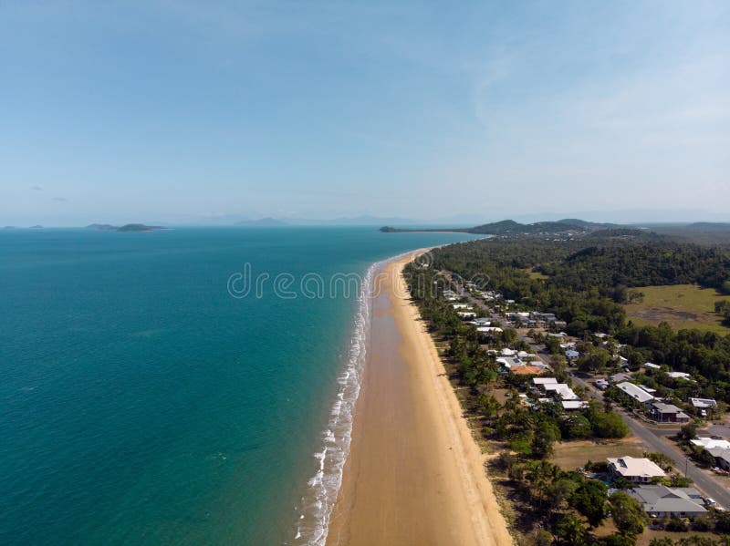 High Angle Shot of a Beach with a Small Town at the Shore Stock Photo ...