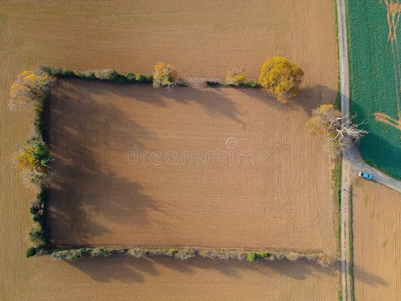 High Angle Shot of a Beautiful Landscape with a Square Made with a Lot ...