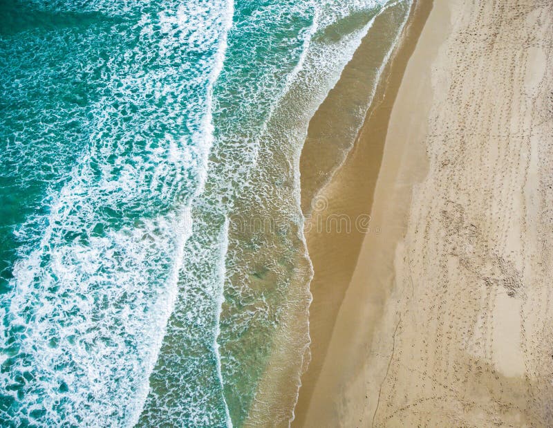 High Angle Shot of a Beautiful Seashore with Foamy Waves Stock Photo ...