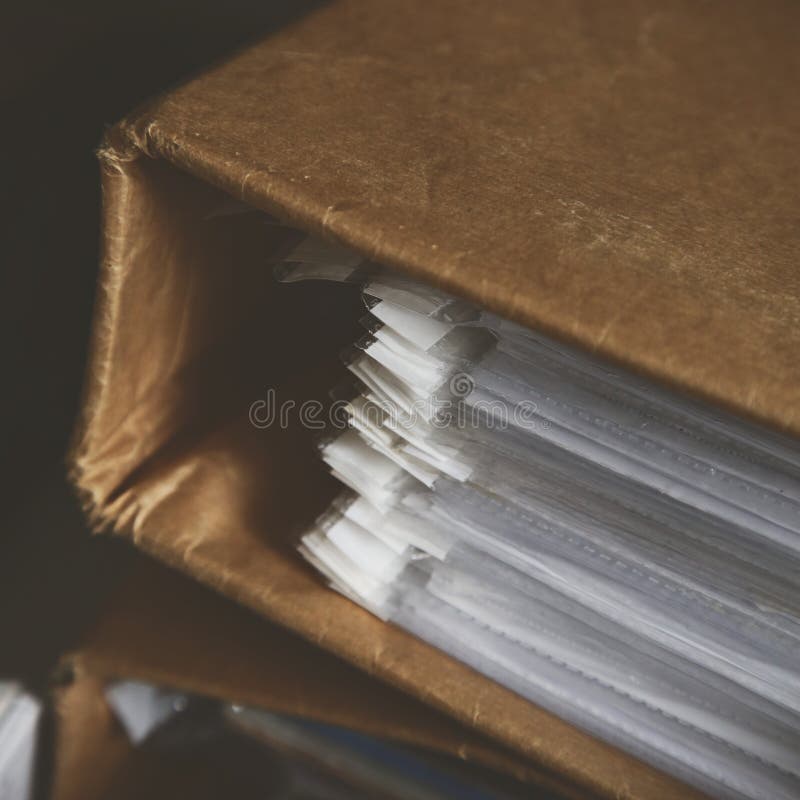 High Angle Shot of Brown Binders Full of Papers and Documents Stock ...