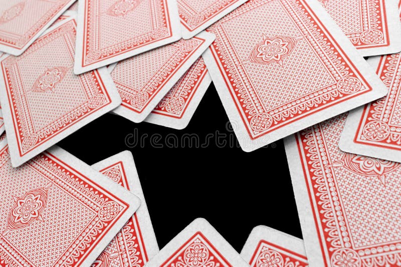 High Angle Shot of a Bunch of Red Playing Cards on a Black Surface ...