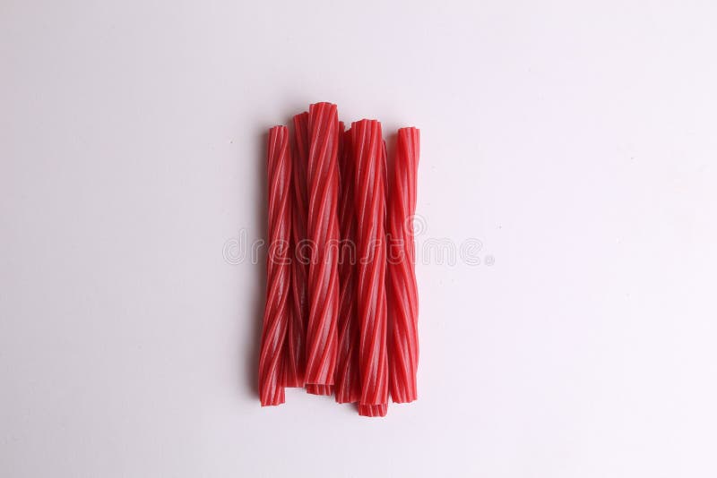 High Angle Shot of a Bunch of Stick Candies Isolated on a White Surface ...