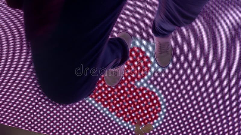 Teenager Dancing on Interactive Floor Display with Hearts Stock Footage ...