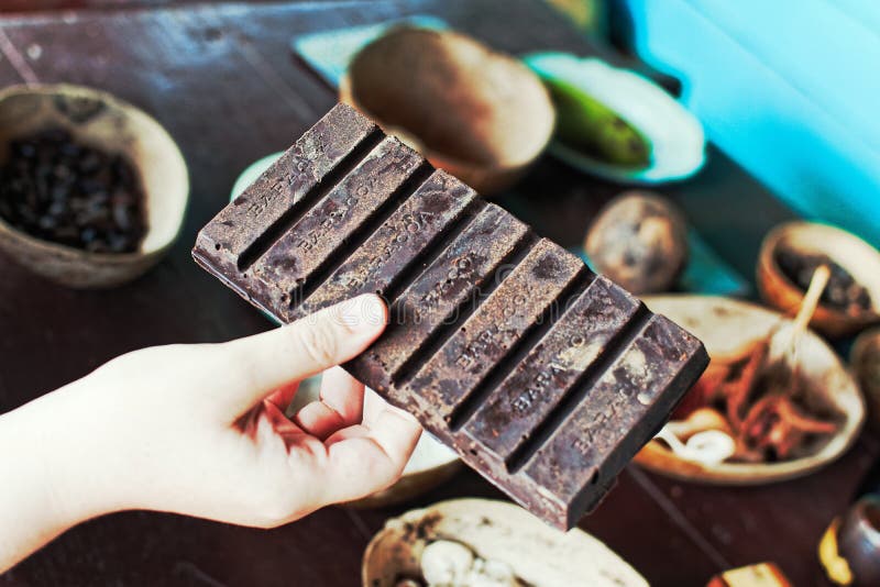 High Angle Shot of a Chocolate Bar Over Many Foods on the Table Stock ...