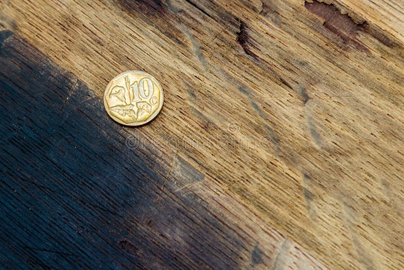 High Angle Shot of a Coin on a Wooden Surface Stock Photo - Image of ...