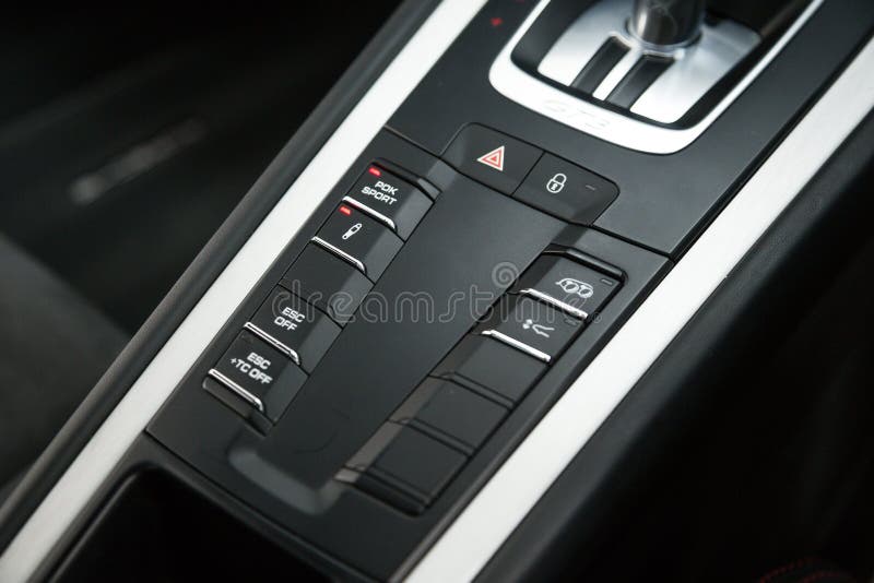 High Angle Shot of Control Buttons of a Black Modern Car Under the ...