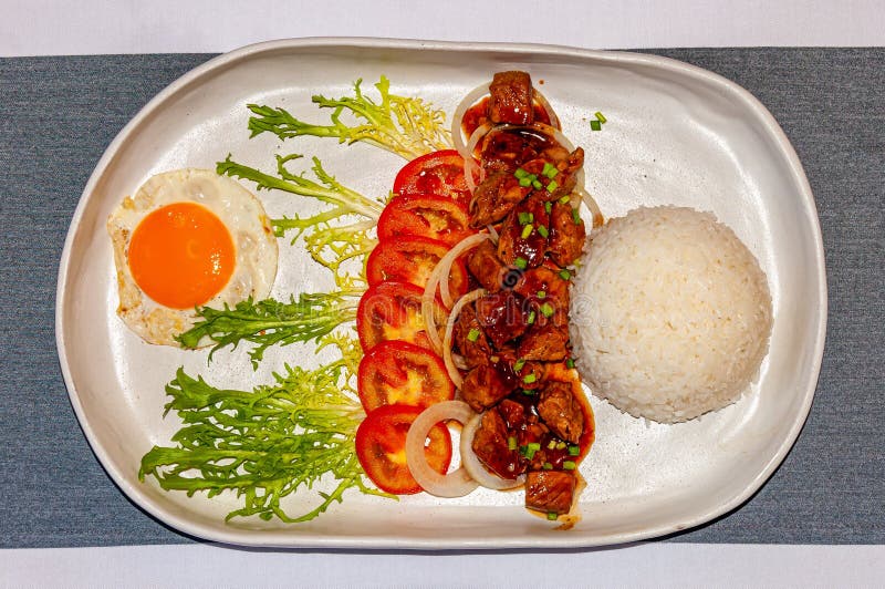 High Angle Shot of a Delicious Dinner Feast Including Meat, Rice ...