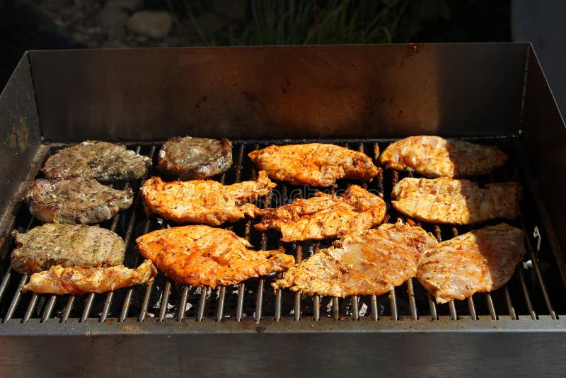 High Angle Shot of Delicious Meat Cooking on a Grill Stock Photo ...