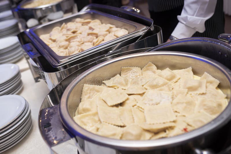 High Angle Shot of Dumplings in Metal Bowls on a Buffet Stock Photo ...