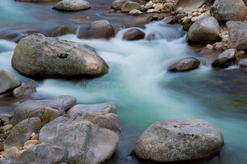 High Angle Shot of a Flowing River Surrounded with Rocks Stock Photo ...
