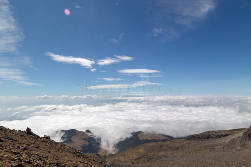 High Angle Shot of Forest on Hills Covered with Clouds Stock Photo ...