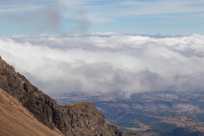 High Angle Shot of Forest on Hills Covered with Clouds Stock Photo ...
