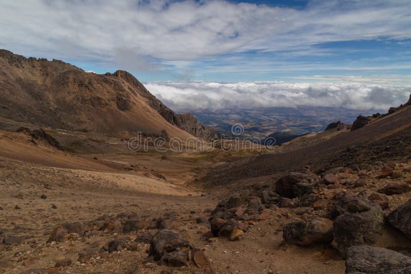High Angle Shot of Forest on Hills Covered with Clouds Stock Photo ...