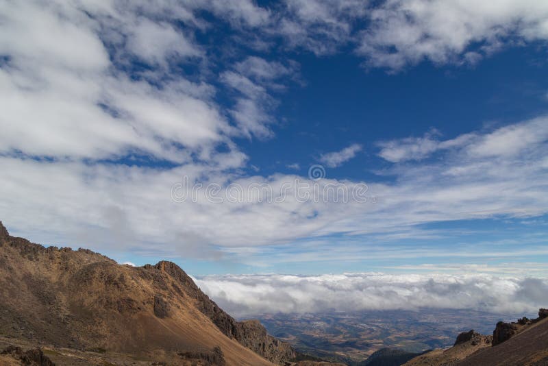 High Angle Shot of Forest on Hills Covered with Clouds Stock Photo ...
