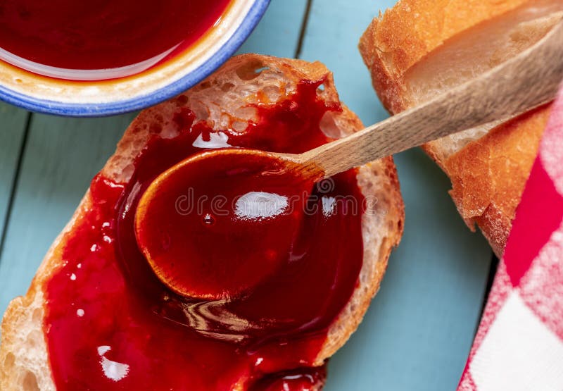 High Angle Shot of Fresh Bread with Homemade Rosehip Jam on a Wooden ...