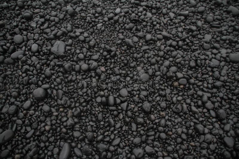 High Angle Shot of an Iceland Land Fully Covered with Small Black ...