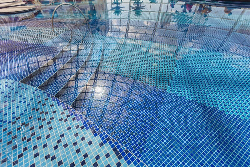 High Angle Shot of an Indoor Swimming Pool with Small Blue Tiles Stock ...