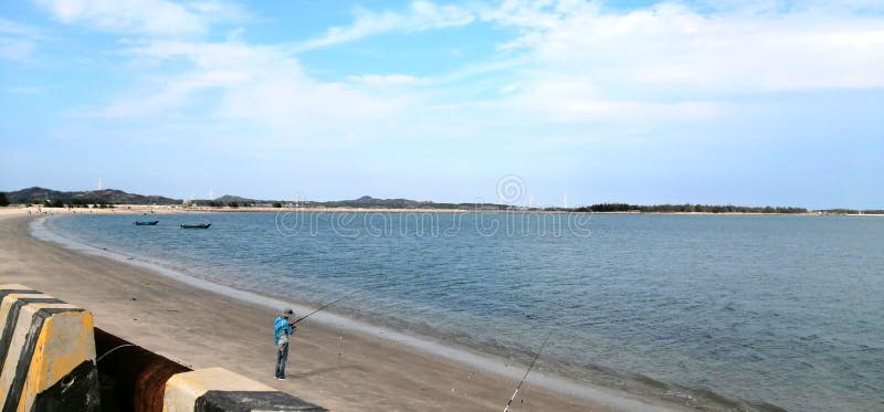 High Angle Shot of a Man Fishing at the Sea Stock Photo - Image of ...