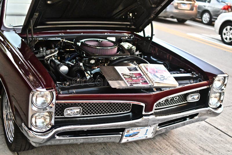 High Angle Shot of a Maroon Vintage Car Showing the Car Engine ...