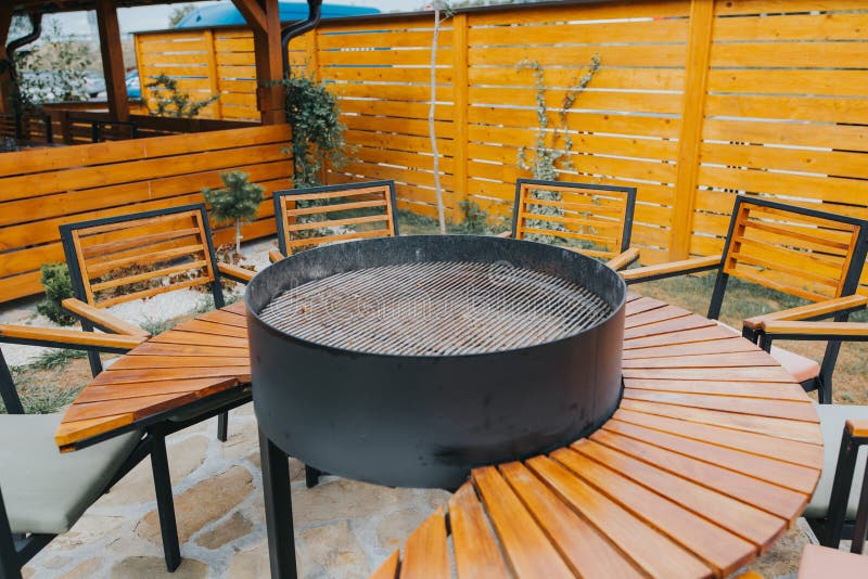 High Angle Shot of an Outside Dining Area with a Round Table and a ...