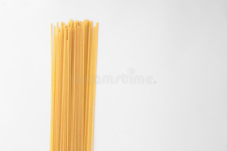 High Angle Shot of a Pile of Uncooked Spaghetti Isolated on a White ...
