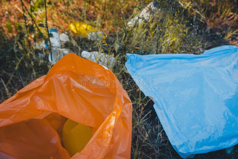 High Angle Shot of Plastic Garbage Bags on the Ground - Plastic ...