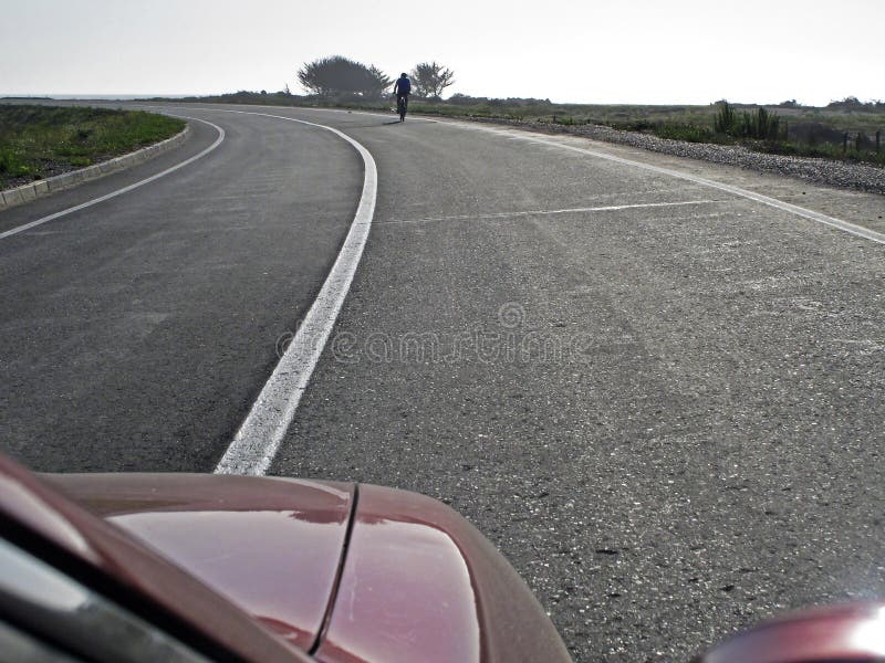 High Angle Shot of a Red Car Driving on an Empty Road Stock Photo ...