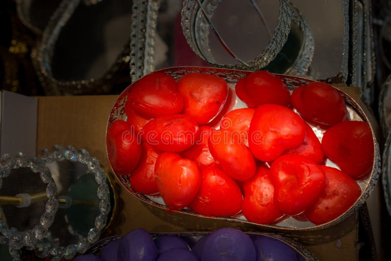 High Angle Shot of Red Objects Shaped Like Hearts on a Table with ...