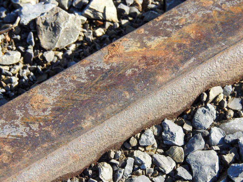 High Angle Shot of a Rusty Iron Tube Surrounded by Pebbles Stock Image ...
