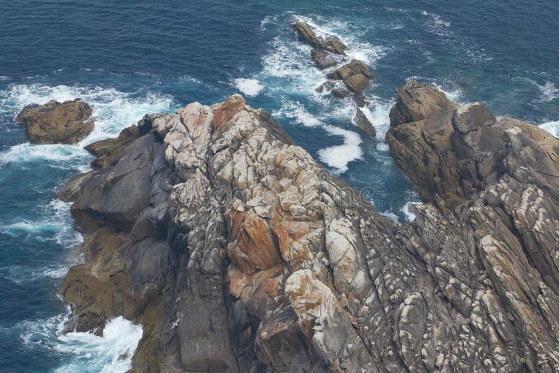 High Angle Shot of a Sea Cliff or Huge Rock Formations in the Sea Stock ...
