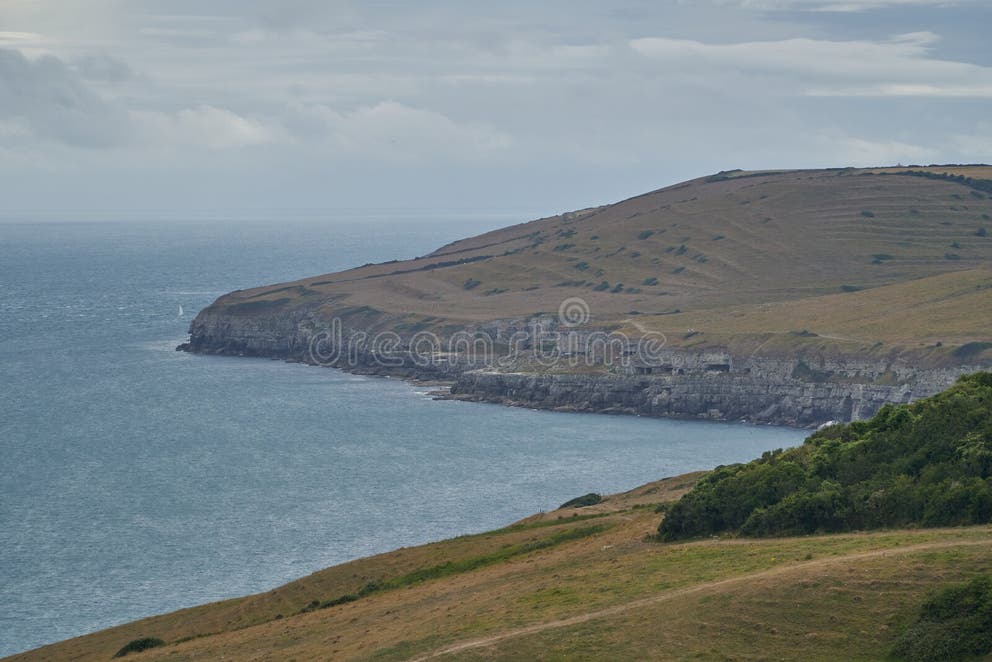 High Angle Shot of a Sea with Rocks Alongside Stock Photo - Image of ...