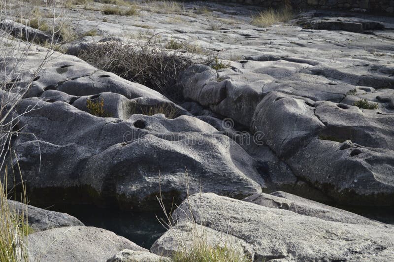High Angle Shot of a Smooth Rocky Surface with Grown Grass Stock Image ...