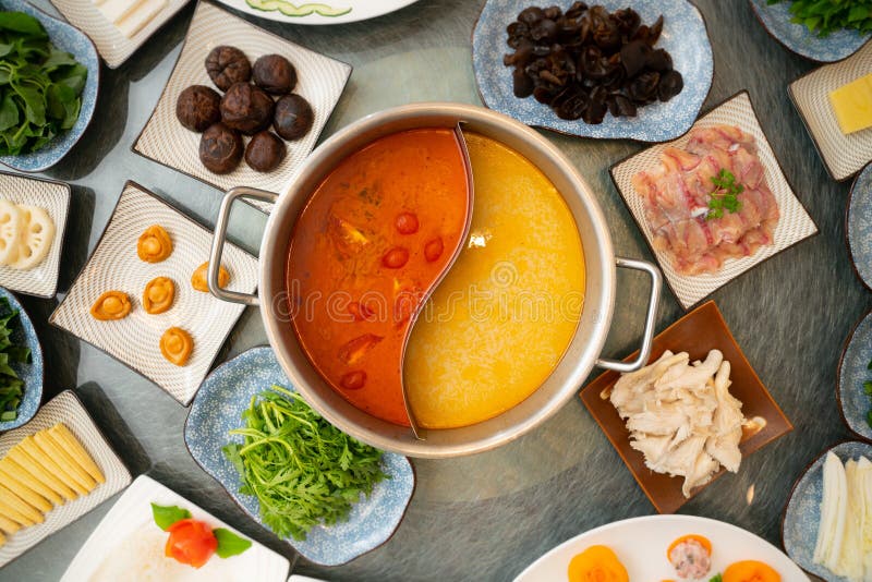 High Angle Shot of Soup in Middle with Side Dishes Stock Photo - Image ...
