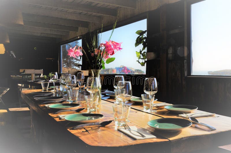 High Angle Shot of a Table Spread at a Cafe at the Beach with Beautiful ...