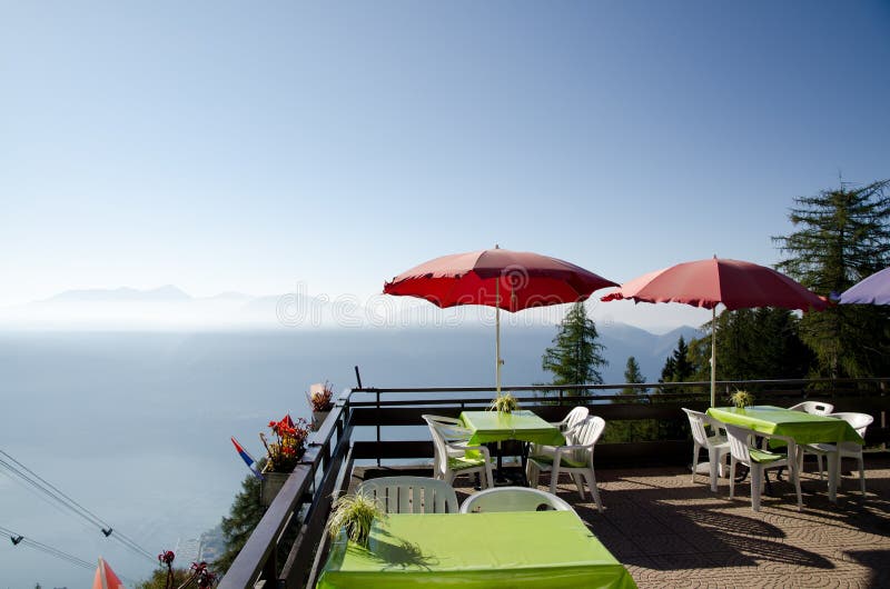 High Angle Shot of a Terrace on the Top of the Mountain Over a Lake ...