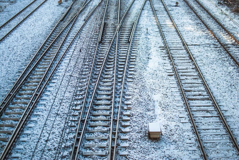 High Angle Shot of Train Tracks Covered with Snow - Great for a ...