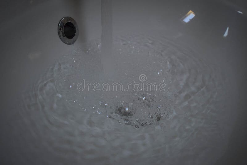 High Angle Shot of Water Flowing into the Tub Stock Photo - Image of ...