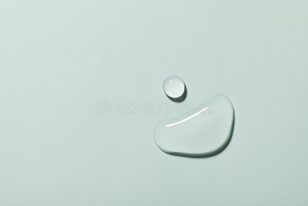 High Angle Shot of Waterdrops on a Blue Surface Stock Image - Image of ...