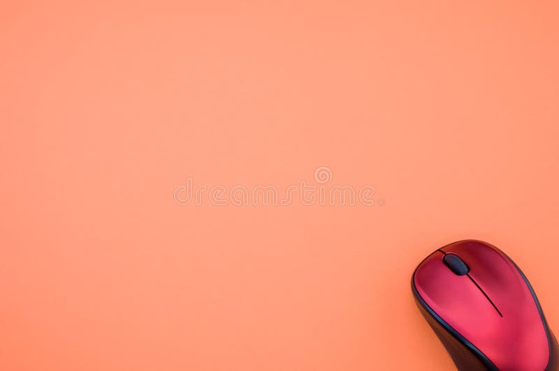 High Angle Shot of a Wireless Mouse on an Orange Surface Stock Photo ...