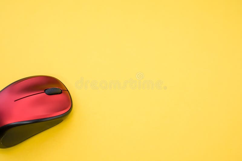 High Angle Shot of a Wireless Mouse on a Yellow Surface Stock Image ...