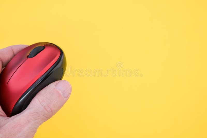 High Angle Shot of a Wireless Mouse on a Yellow Surface Stock Photo ...