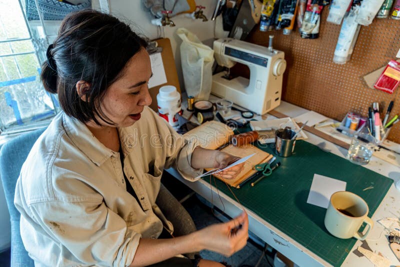 High Angle Shot of a Young Female Artist Working with String in Her Workshop Stock Image - Image ...