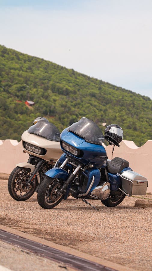 A Vertical Shot of Two Motorcycle on the Side of a Road Stock Image ...