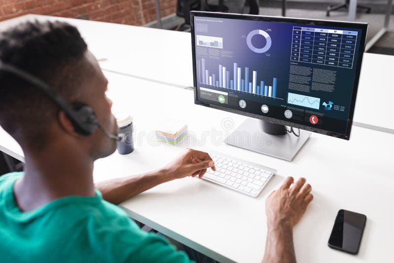 High Angle View of African American Businessman Analyzing Graphs Over ...
