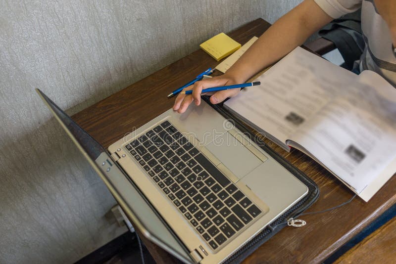 High Angle View of Student Studying with Laptop on Table Stock Image ...