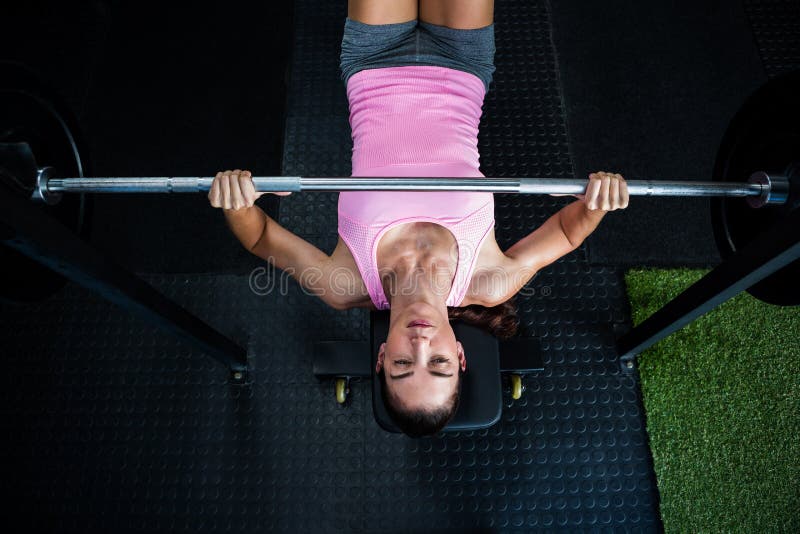 High Angle View of Athlete Holding Barbell while Lying on Bench Press ...