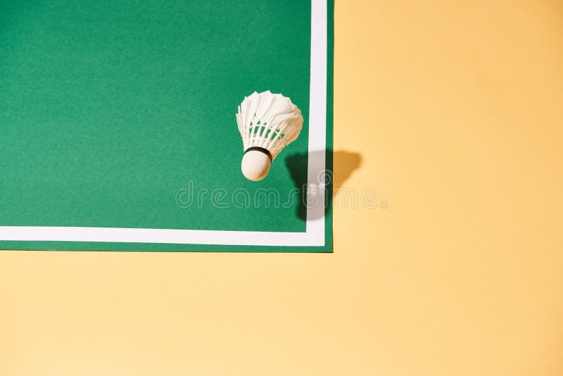 High Angle View of Badminton Shuttlecock on Green Court and Yellow ...