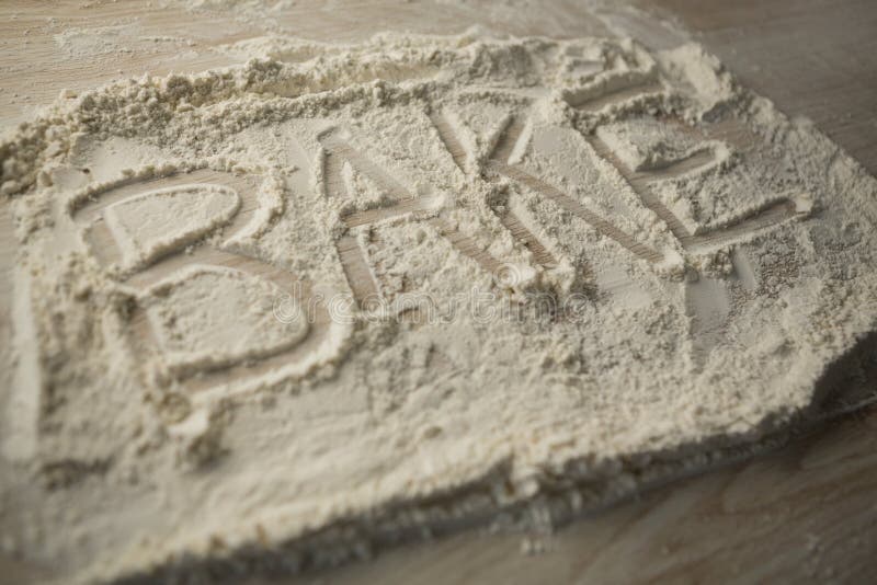 High Angle View of Bake Text on Flour Stock Photo - Image of closeup ...