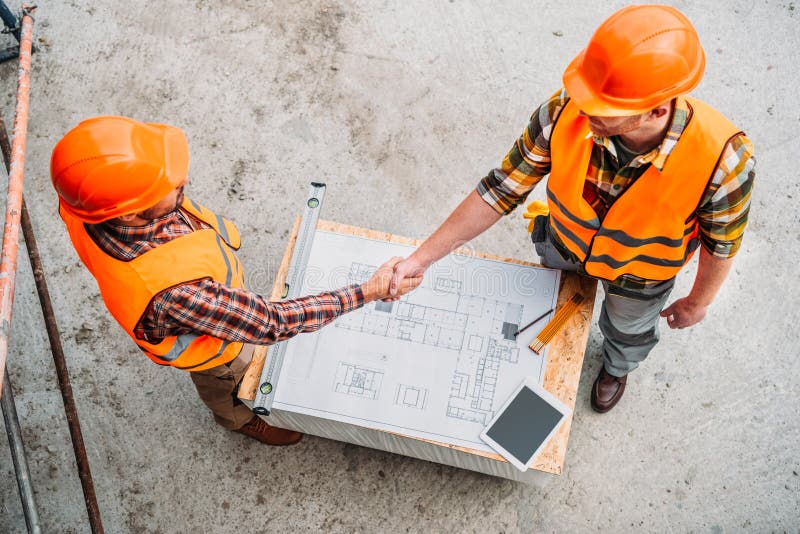 Handshake Over Construction Site Stock Photo - Image of hands, shake ...