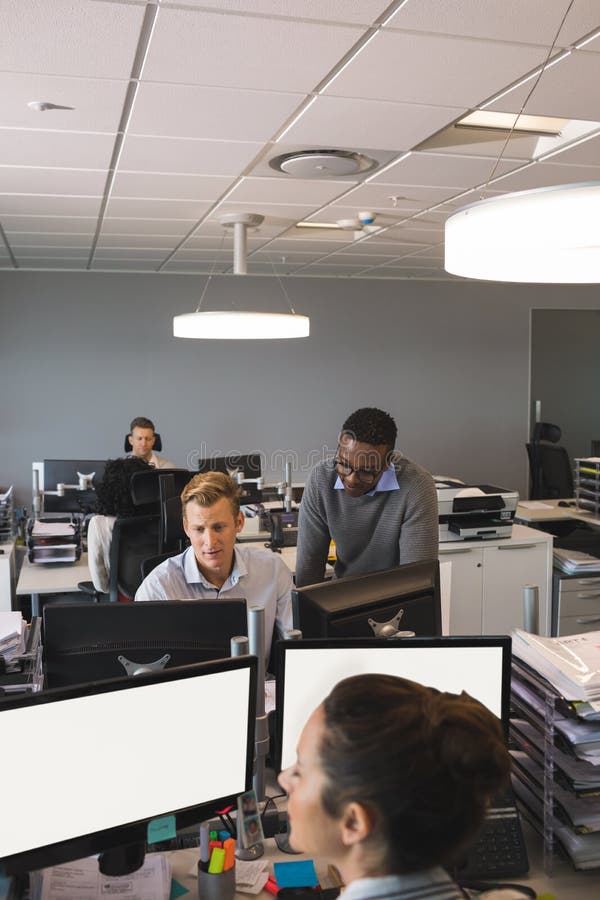 High Angle View of Business Colleagues Working in Office Stock Image ...